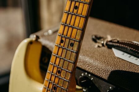 Learn guitar hammer-ons by starting with fretting and building power